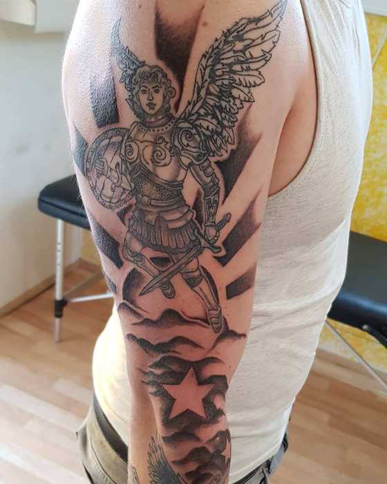 50 cool arm tattoos design ideas for men and women - Legit.ng