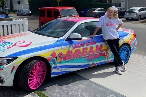 A tour of JoJo Siwa's car collection that's bright, chaotic, and wildly ...